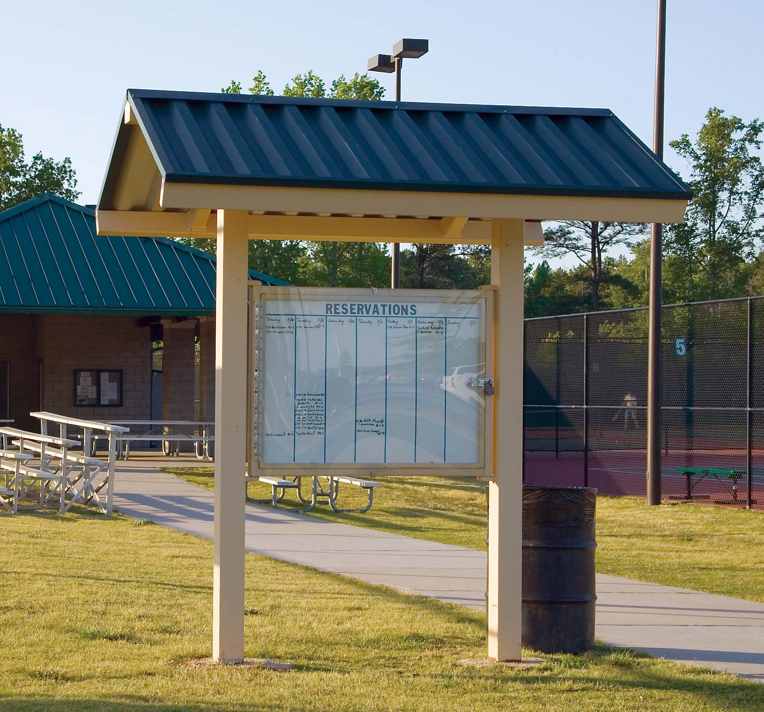 Kiosk shade model shade shelter for use in parks and landscaping.